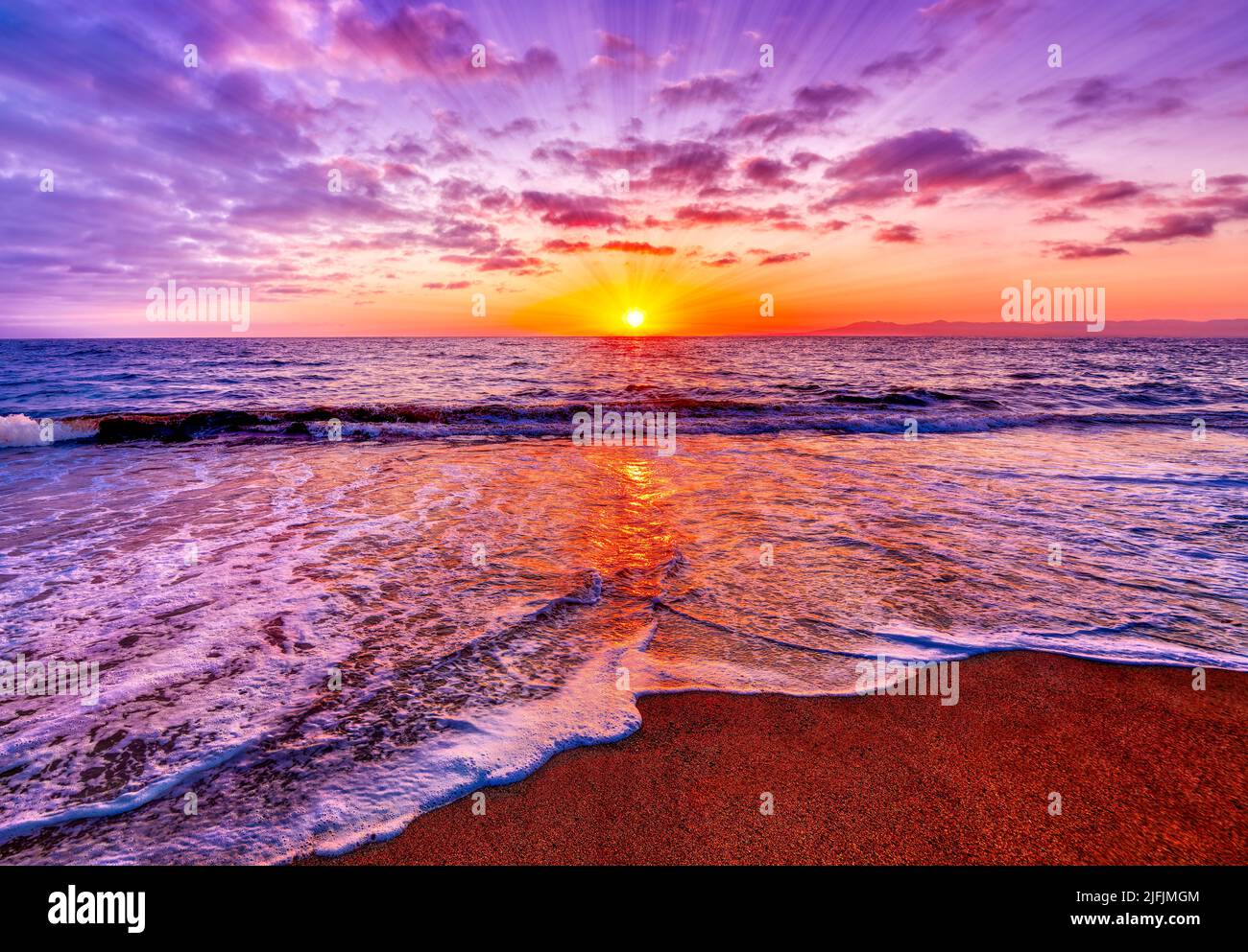 Sun Rays Are Bursting On The Ocean Horizon With A Vivid Colorful Sunset ...