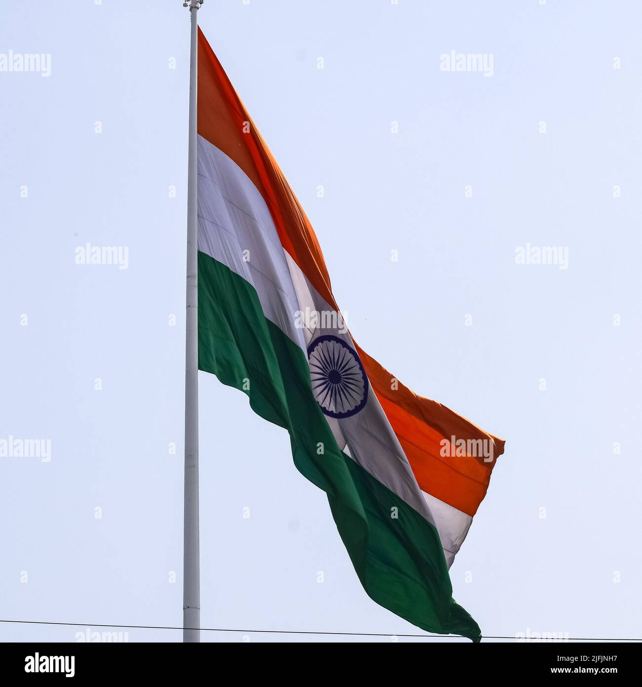 India flag flying high at Connaught Place with pride in blue sky, India ...
