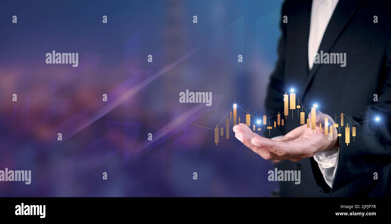 Businessman show golden stock market bar chart grow up to target ...