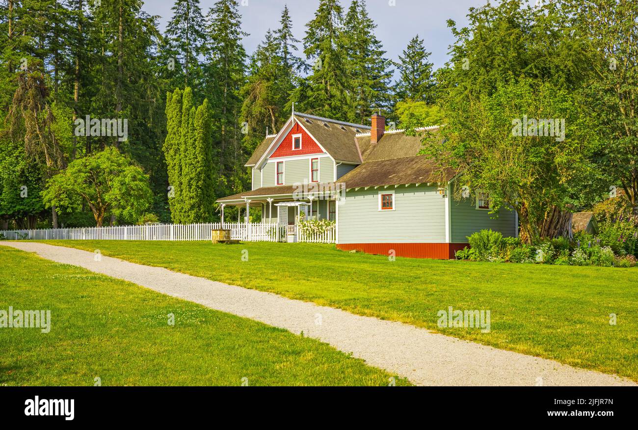 Beautiful traditional rural house in countryside. Garden design with a ...
