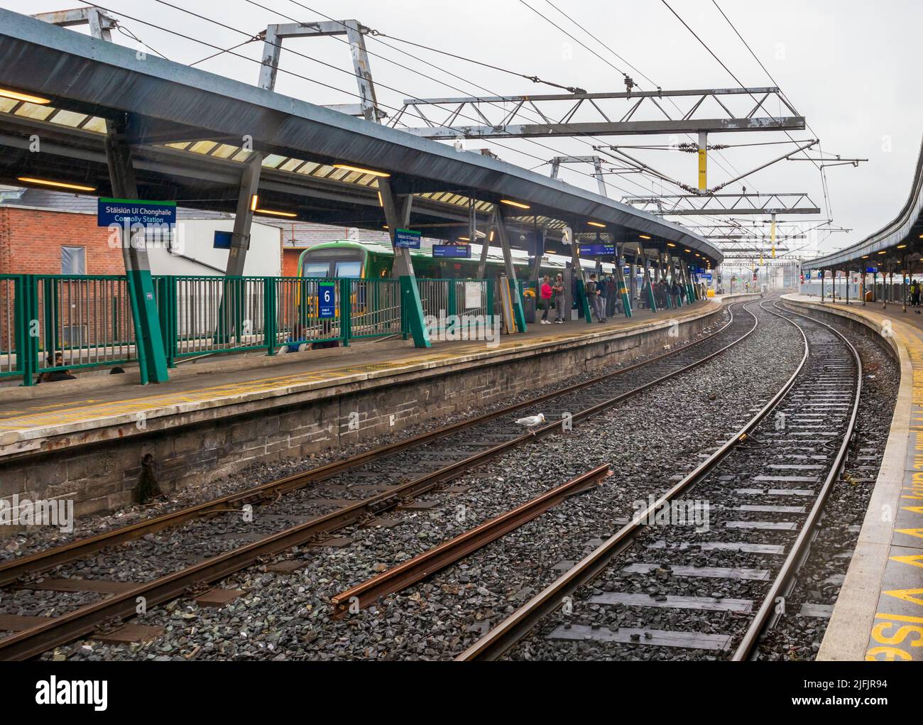 Dublin, Ireland - June 5, 2022: Passengers on the platform of Connolly ...