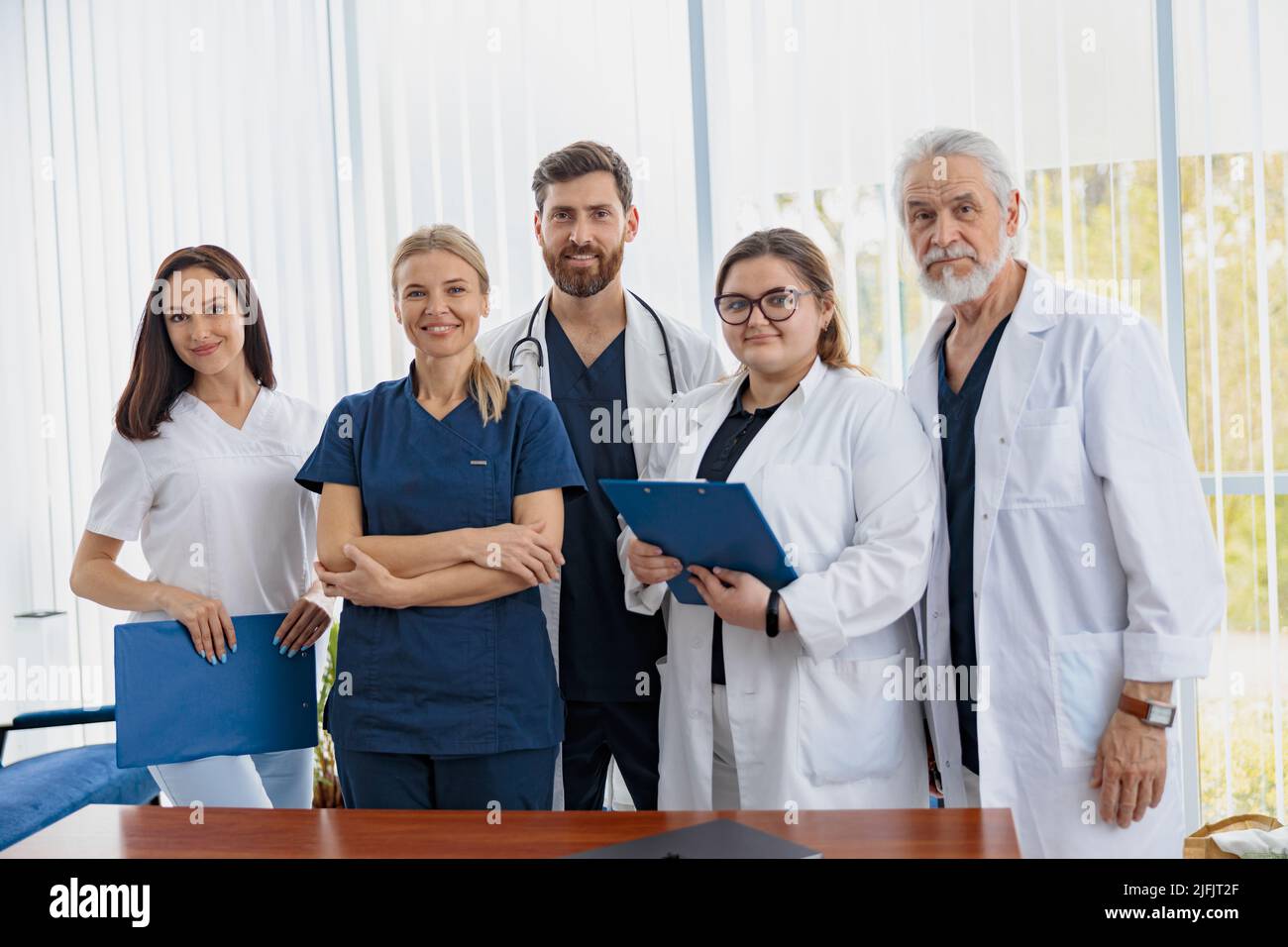 Portrait of a group of happy and successful doctors and nurses in ...