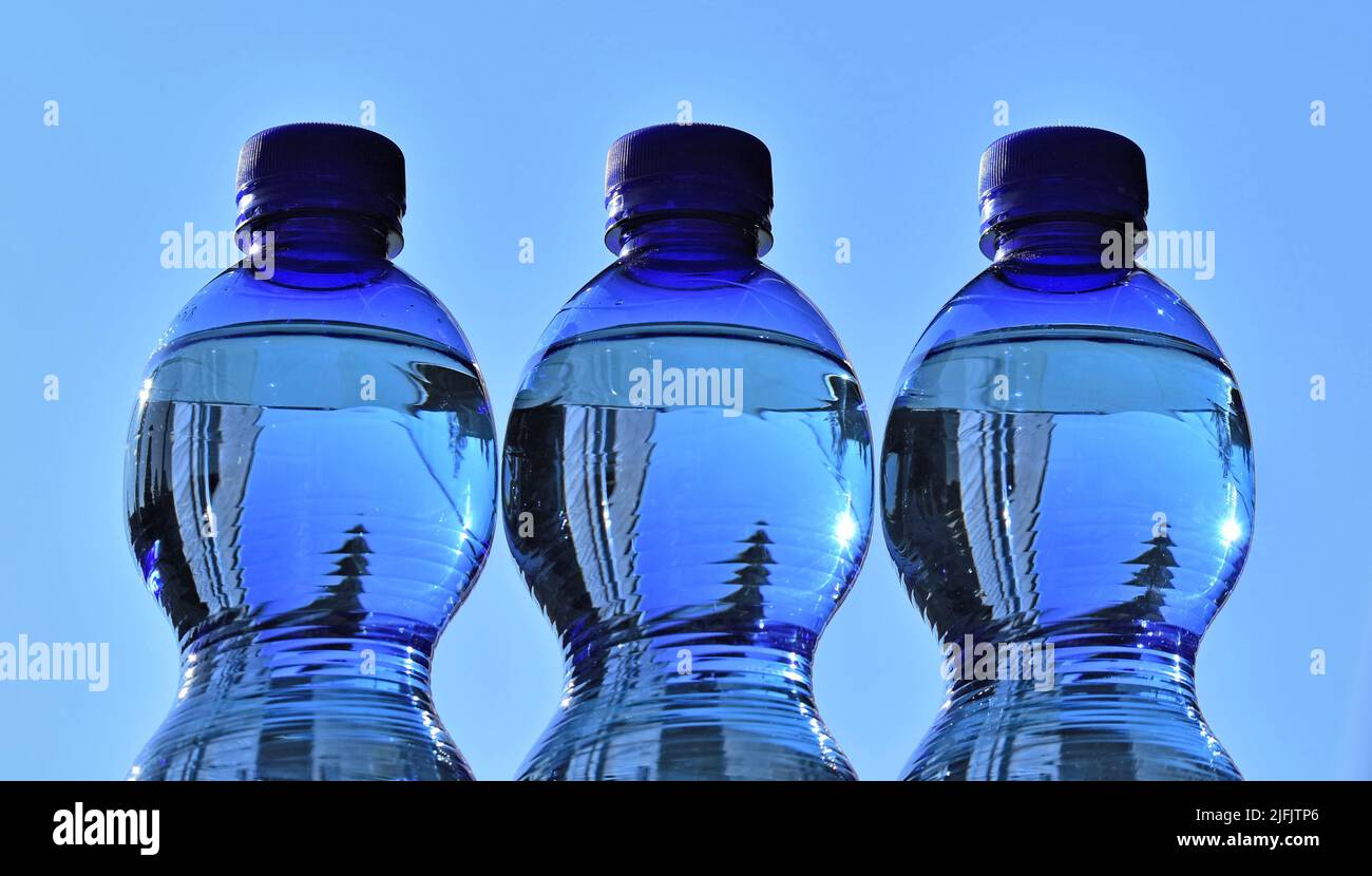 blue plastic drink water bottles Stock Photo - Alamy