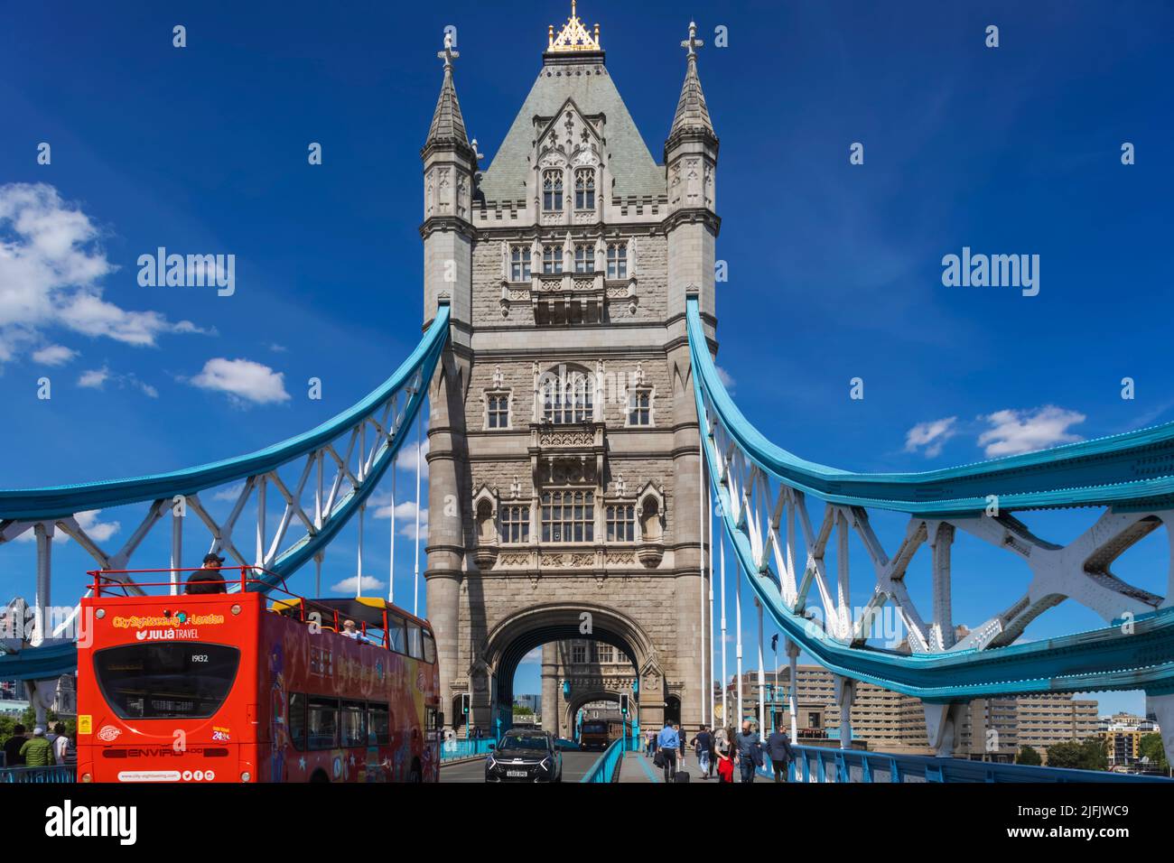 Tower bridge with red double decker bus in the daytime hi-res stock ...