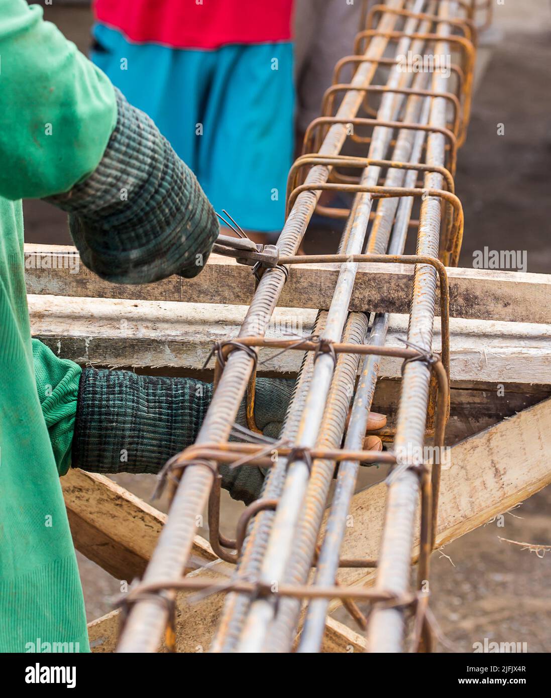 Close up worker tying steel in the construction site Stock Photo - Alamy