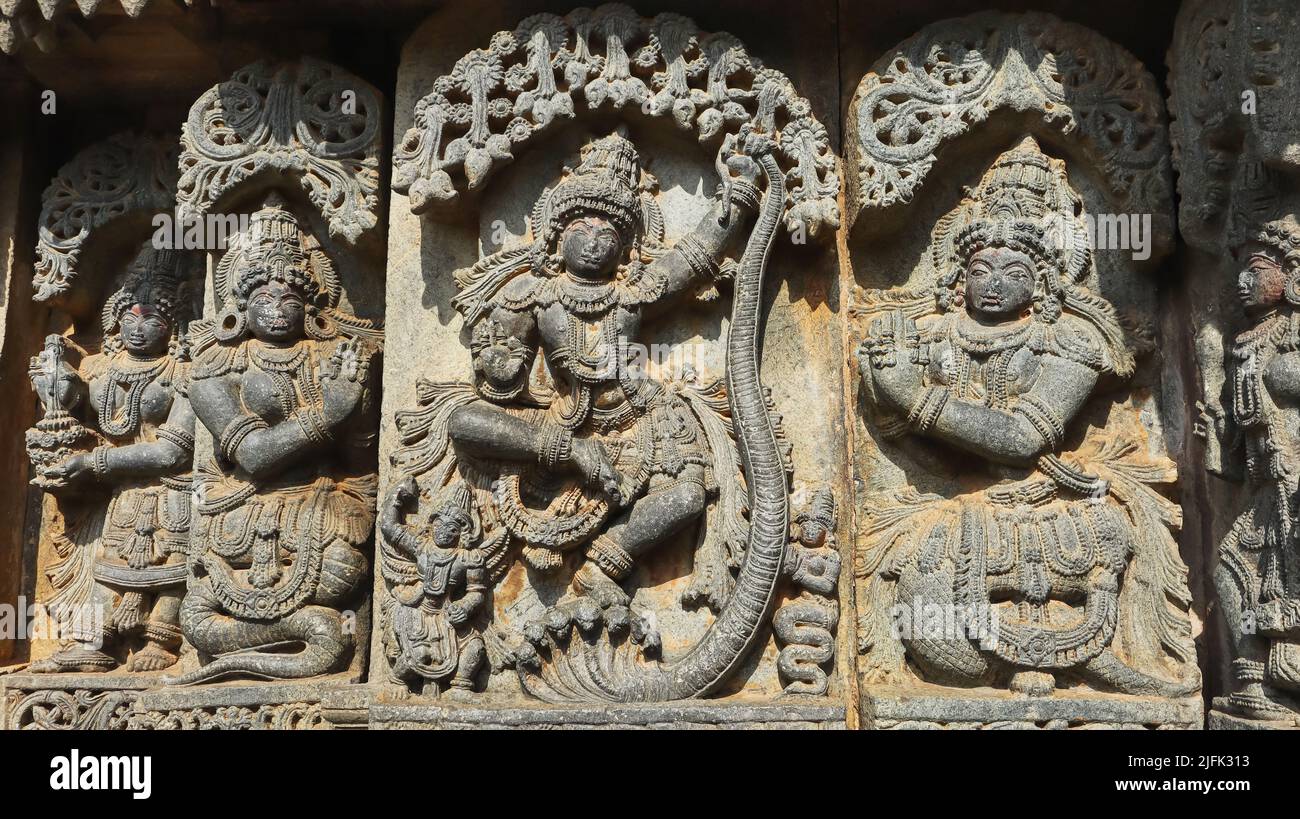 Sculptures of Lord Krishna dancing on Kaliya Snake and Nagas on either ...