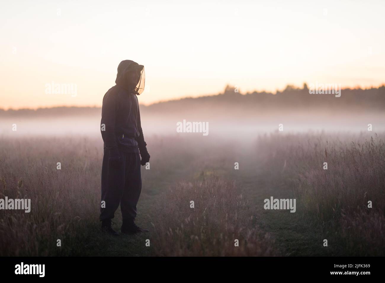 Man with mosquito net hi-res stock photography and images - Alamy
