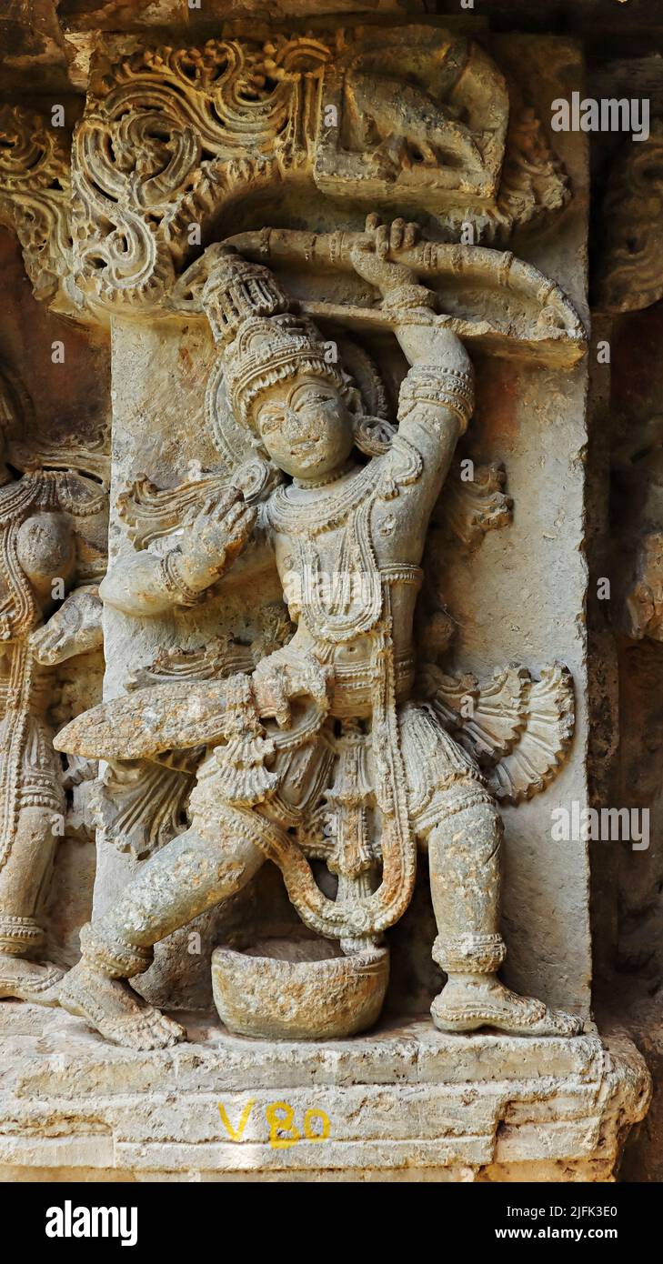 Sculpture of Arjuna shooting a wooden fish by seeing its Reflection in ...