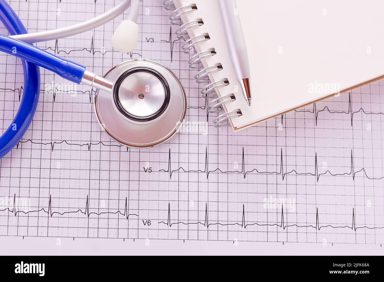 Blue stethoscope and cardiogram pulse trace concept for cardiovascular ...