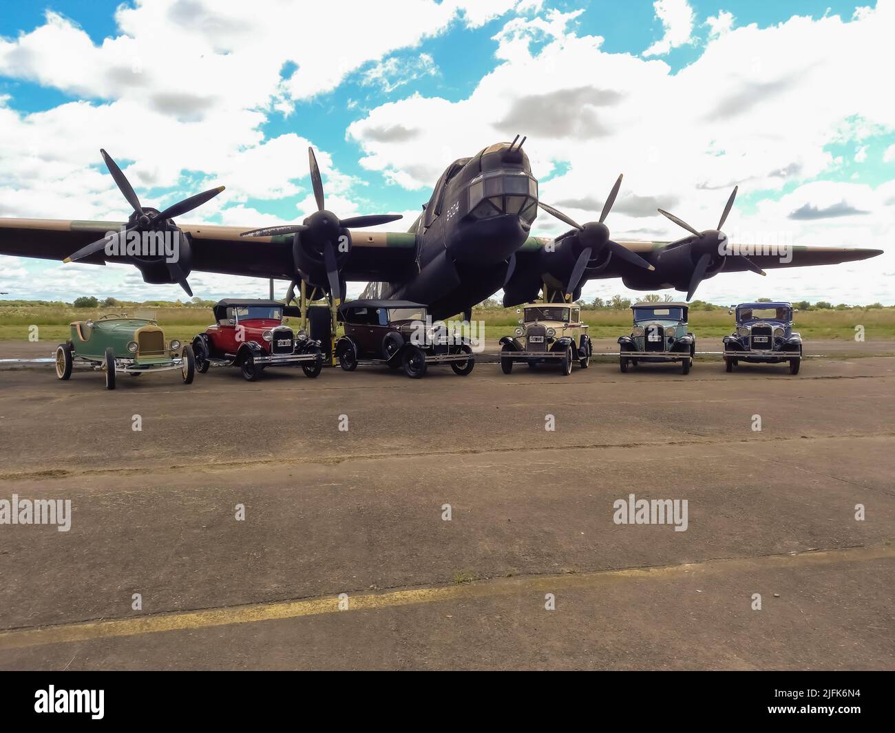 Several old Ford Model A in different body styles circa 1930 parked in ...