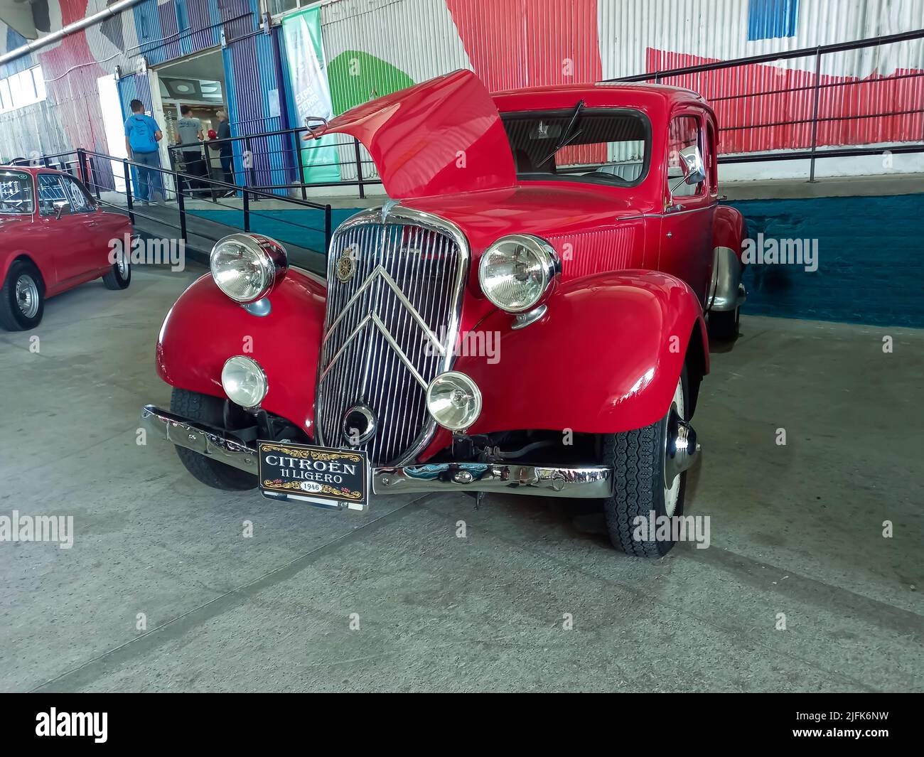 vintage red elegant Citroen 11 Traction Avant Legere in a warehouse ...