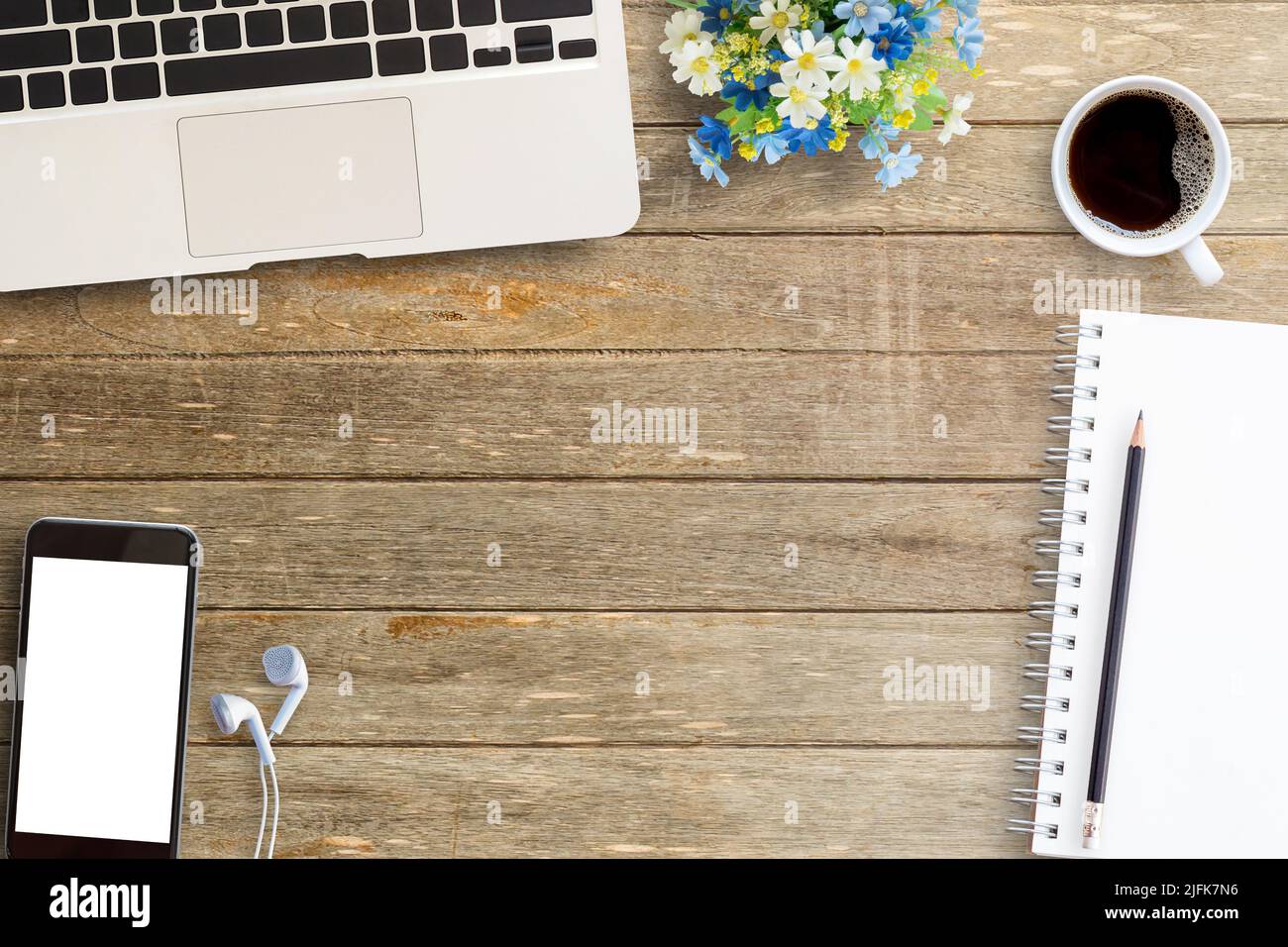 Office desk -Laptop computer with smart phone notebook and coffee cup ...