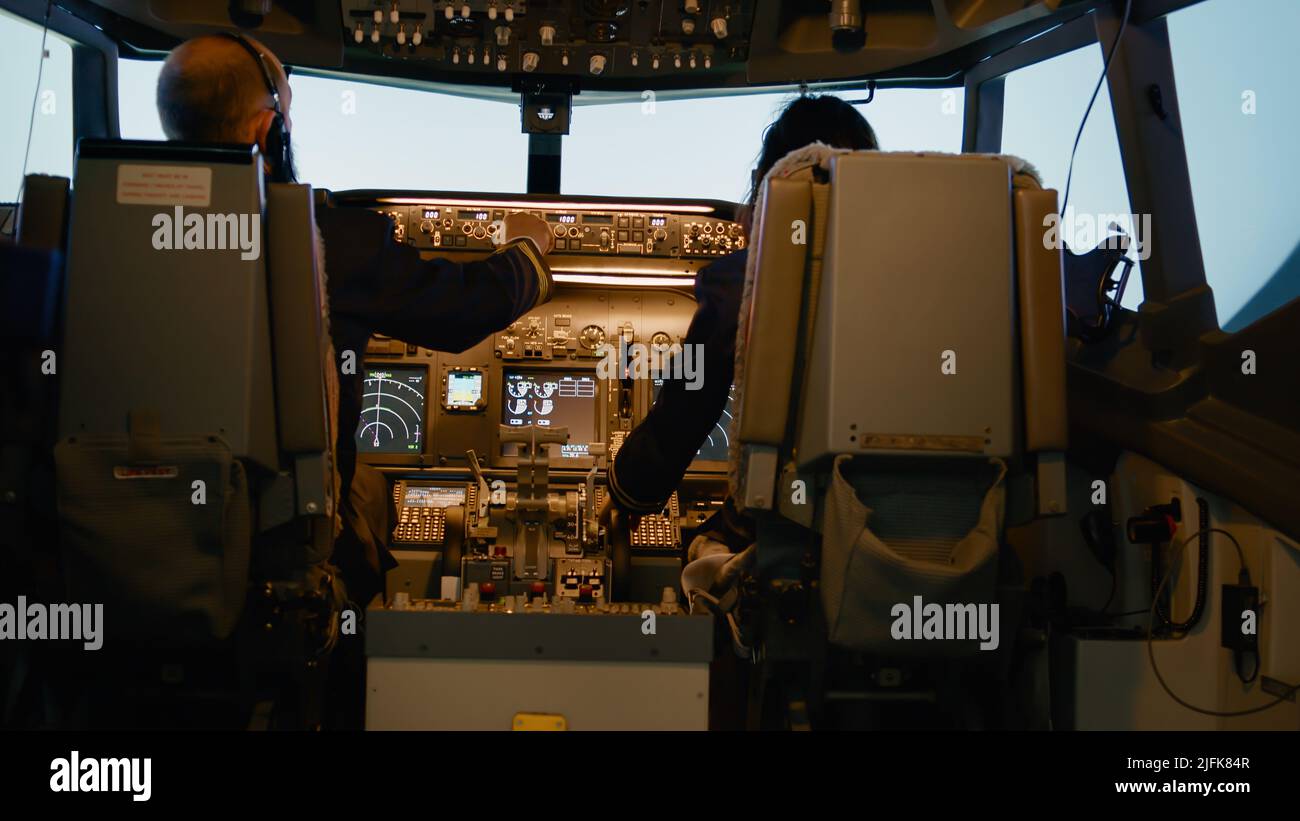 Captain and copilot inserting destination coordinates and fixing ...