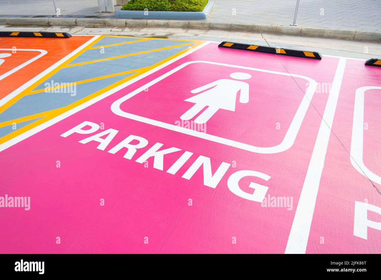 closeup lady parking sign painted on the floor of parking area Stock ...