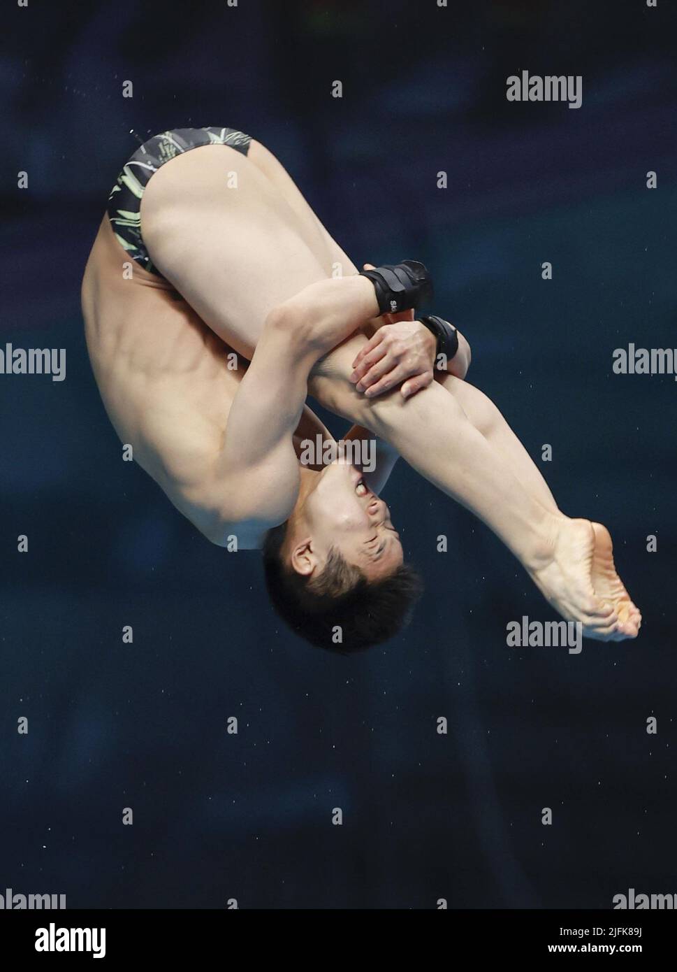 Rikuto Tamai of Japan performs in the men's individual 10-meter ...