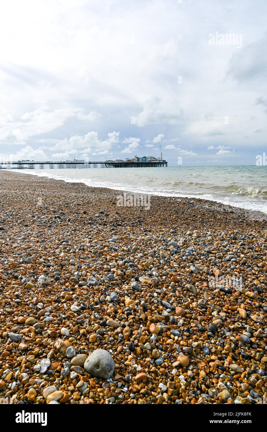Brighton UK - Brighton beach with Palace Pier in background along East ...