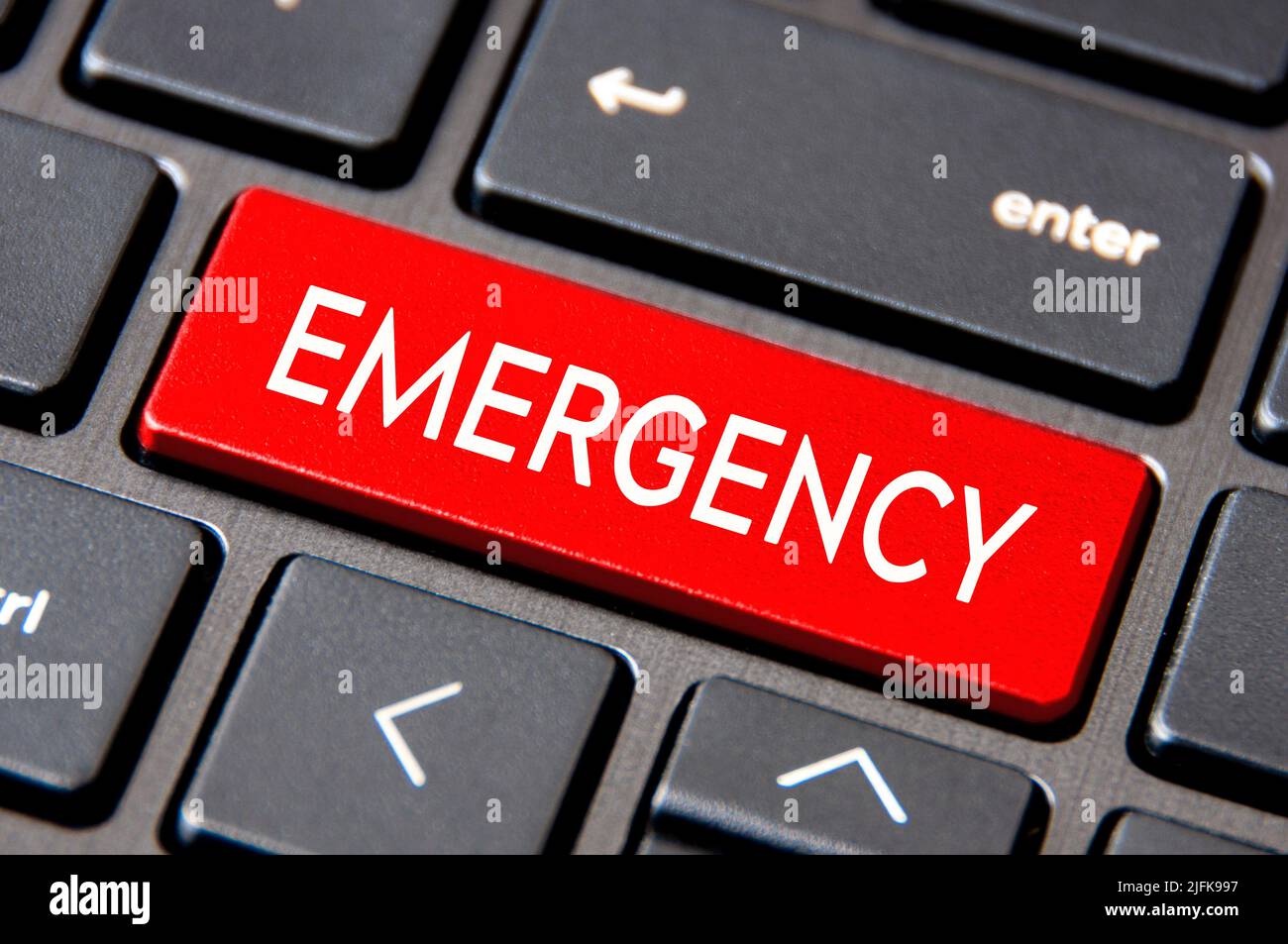 Emergency text on Laptop Keyboard Key. Urgency concept Stock Photo - Alamy