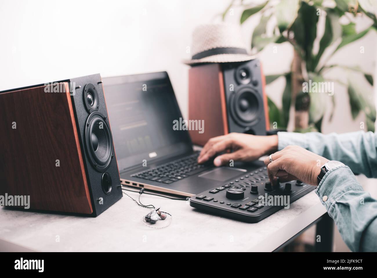 Workstation with speakers and computer in studio. Desktop in home ...