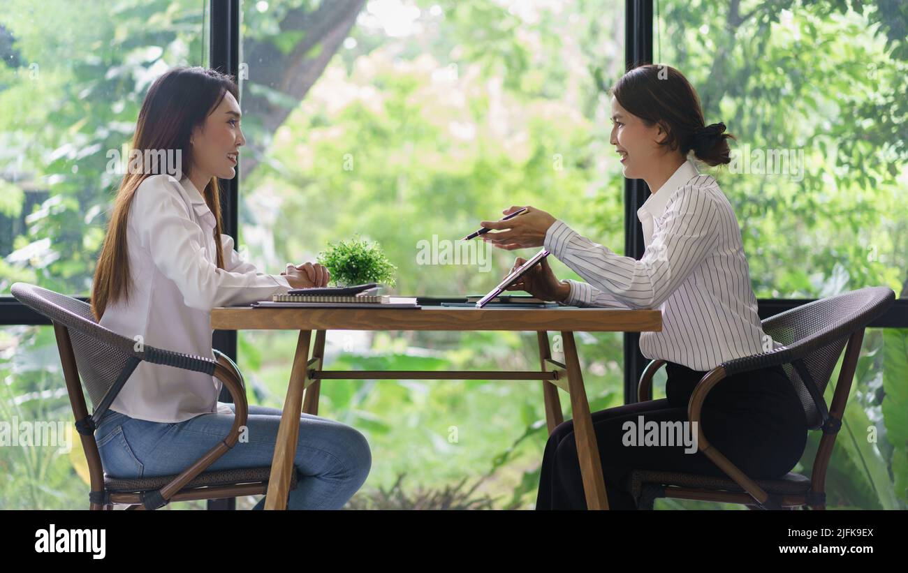 Coworker business concept, Businesswoman hold chart document to ...