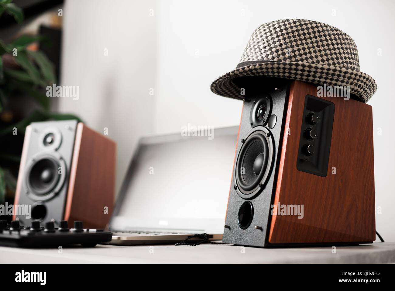 Workstation with speakers and computer in studio. Desktop in home ...