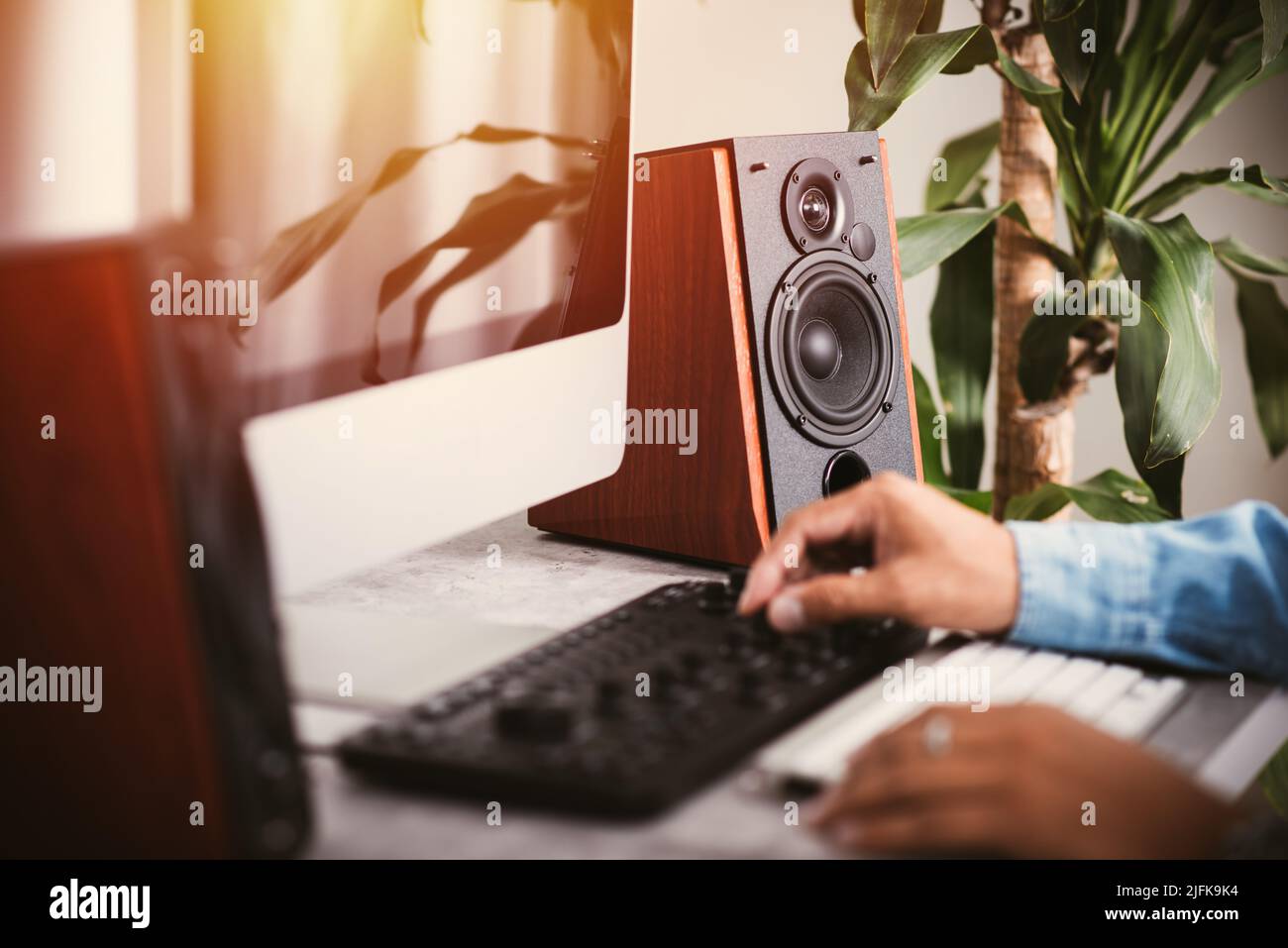 Workstation with speakers and computer in studio. Desktop in home ...