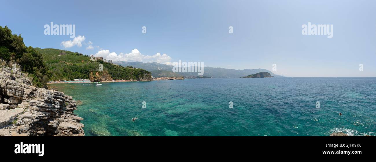 Panoramic view of Budva bay with Mogren beach towards Old Town and ...