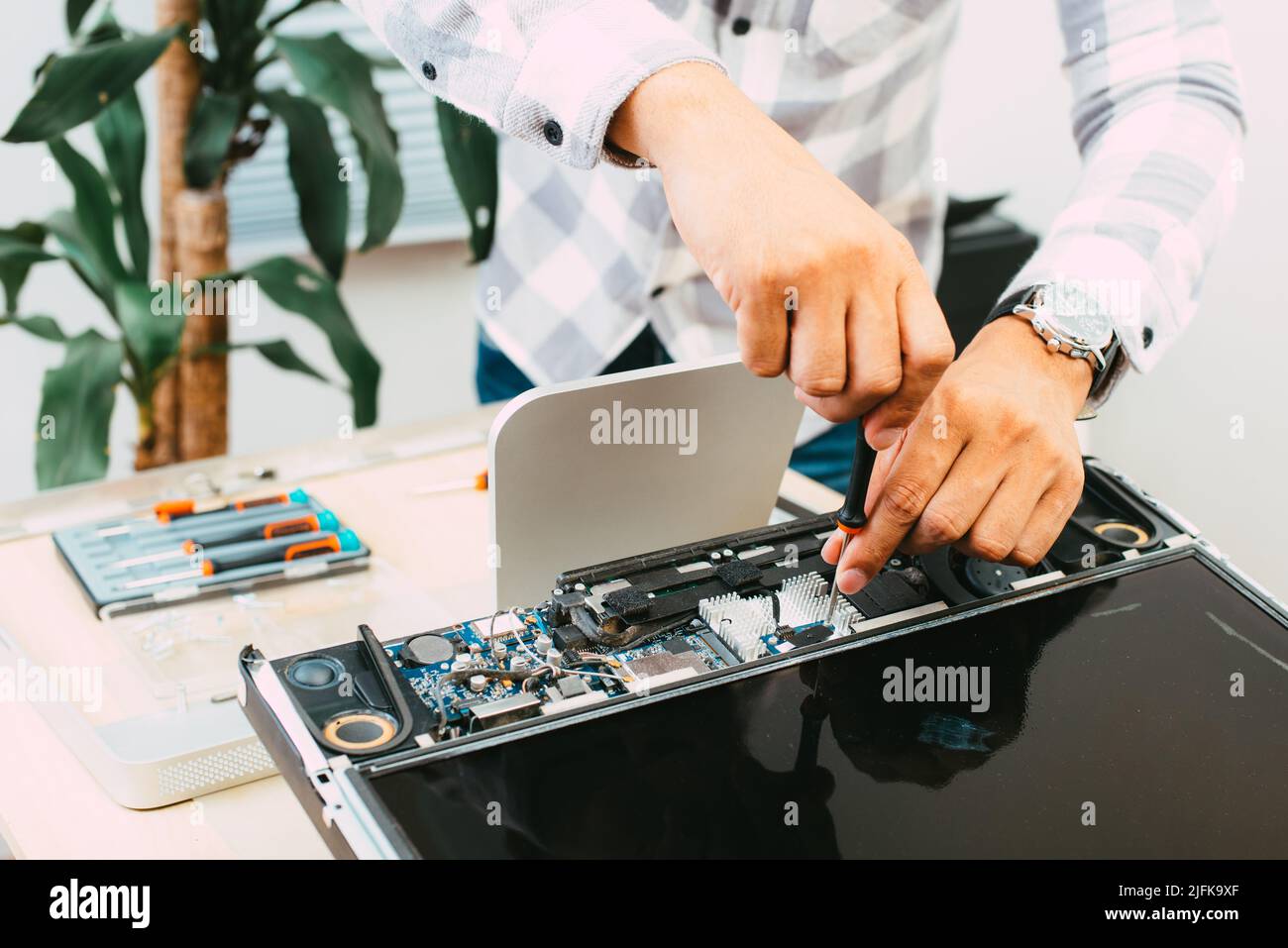 Technician reparing a broken computer. Computer service and repair ...