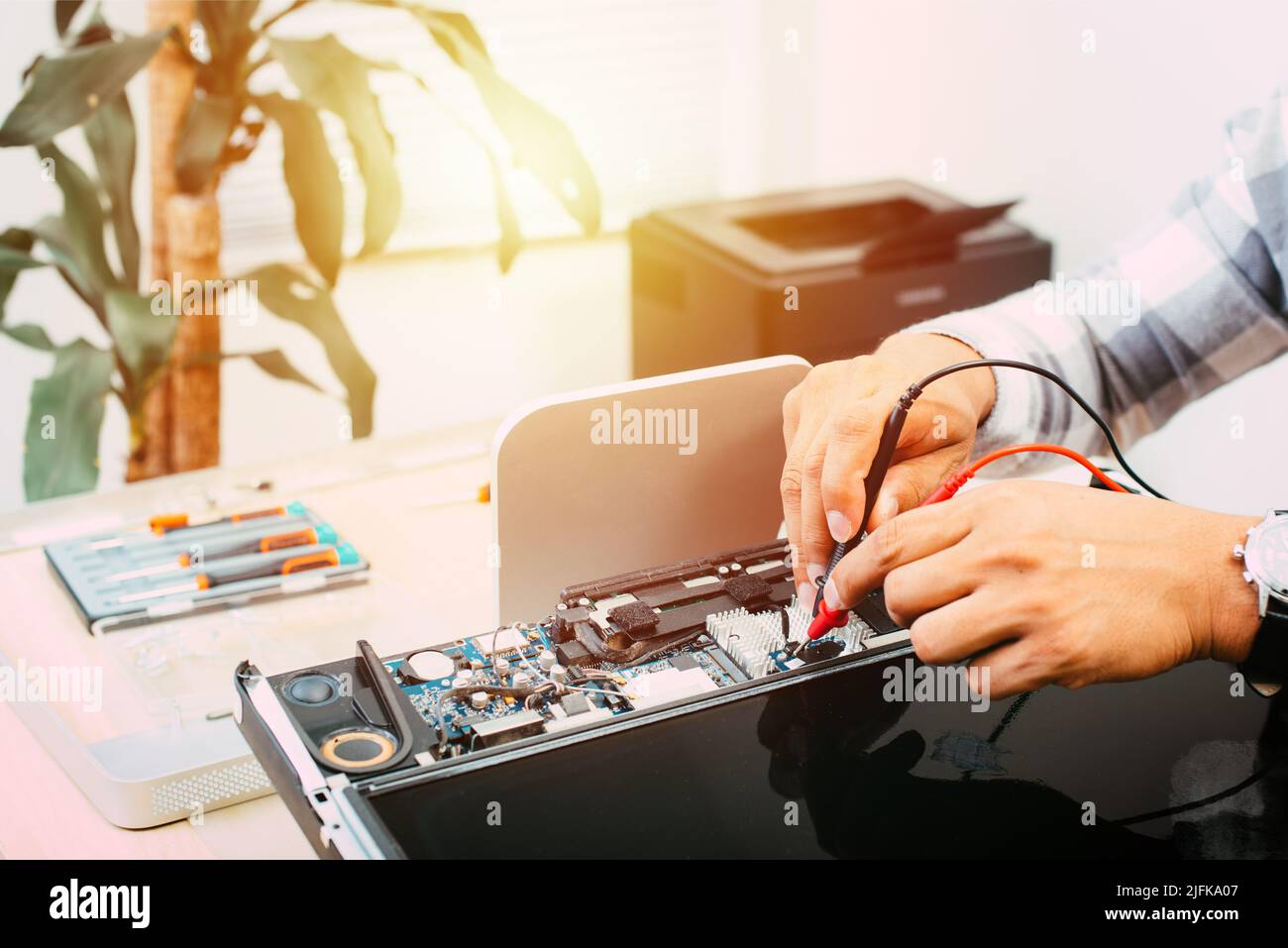 Technician reparing a broken computer. Computer service and repair ...