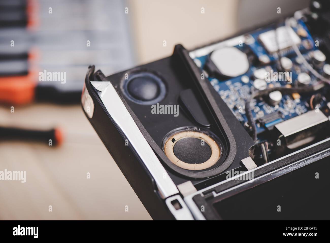 Closeup broken spaker inside the old computer. Computer service and ...