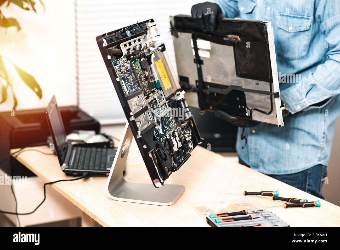 Technician reparing a broken computer. Computer service and repair ...