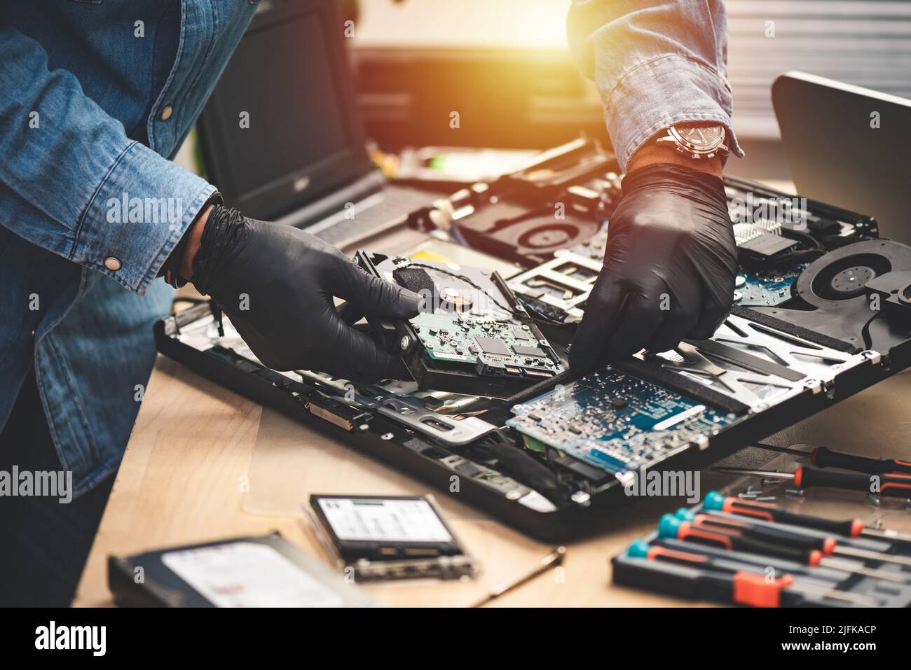 Technician reparing a broken computer. Computer service and repair ...