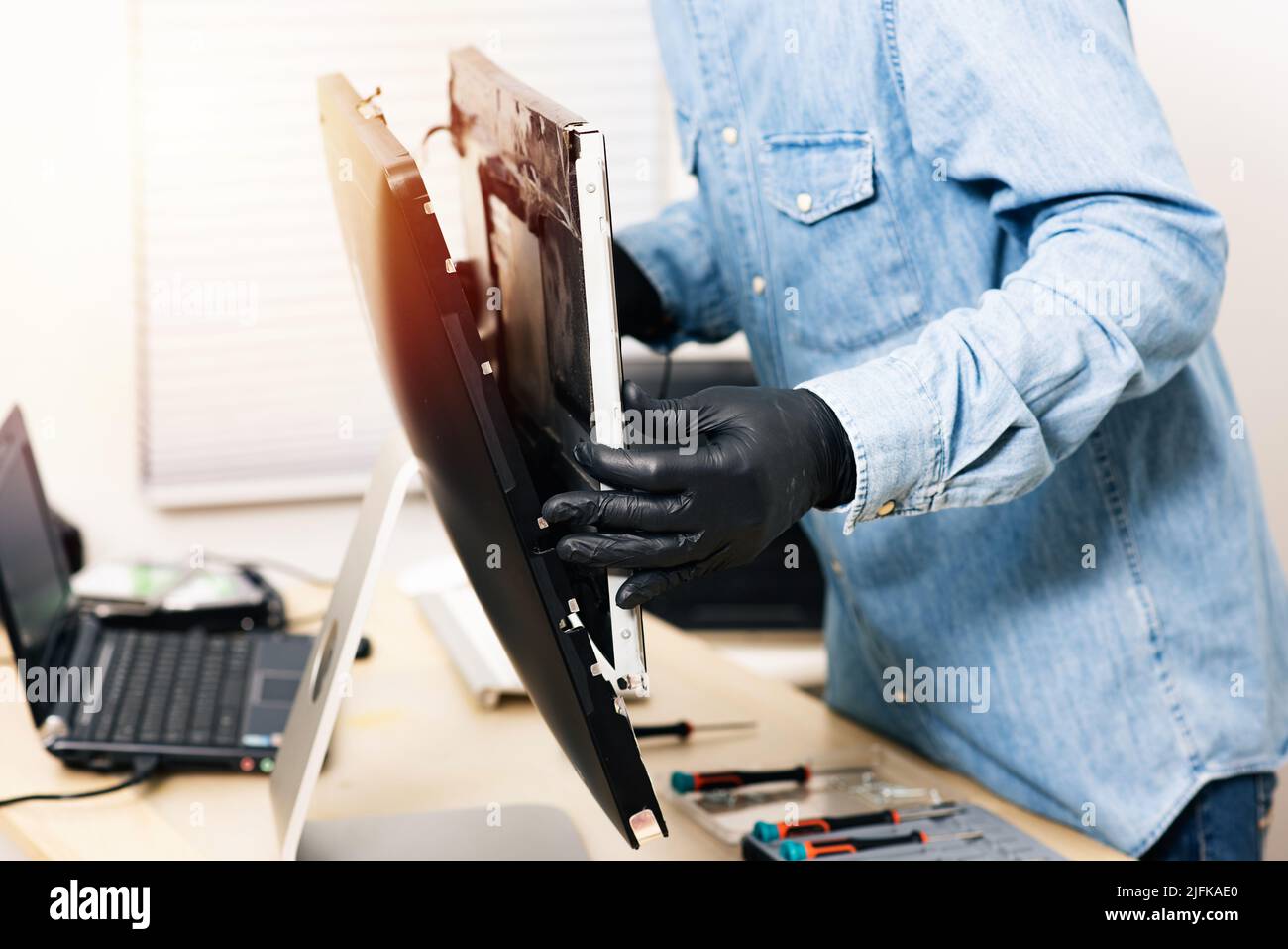 Technician reparing a broken computer. Computer service and repair ...