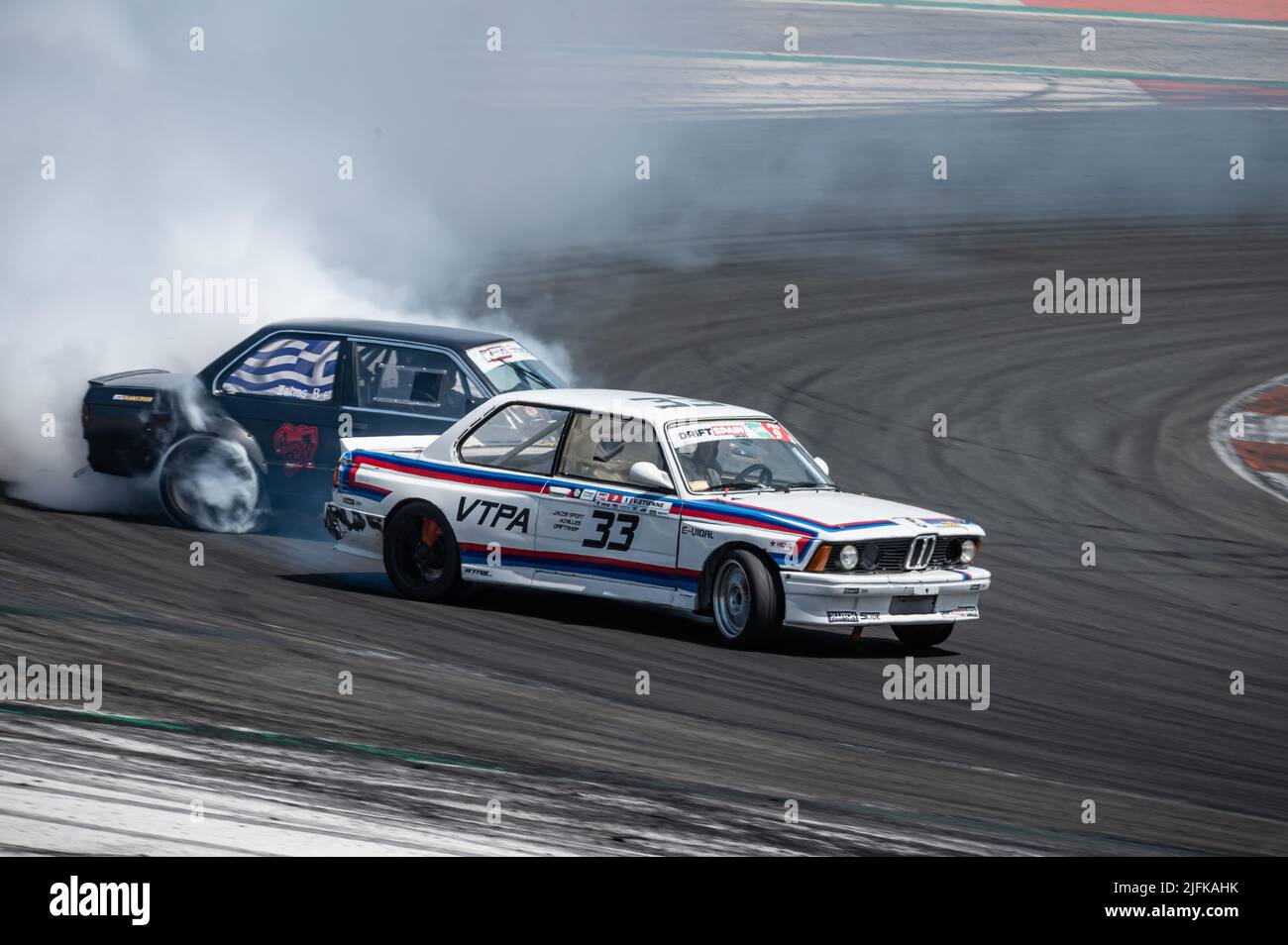 BMW E21 Alpina skidding in the battle on the Valencia racing circuit ...