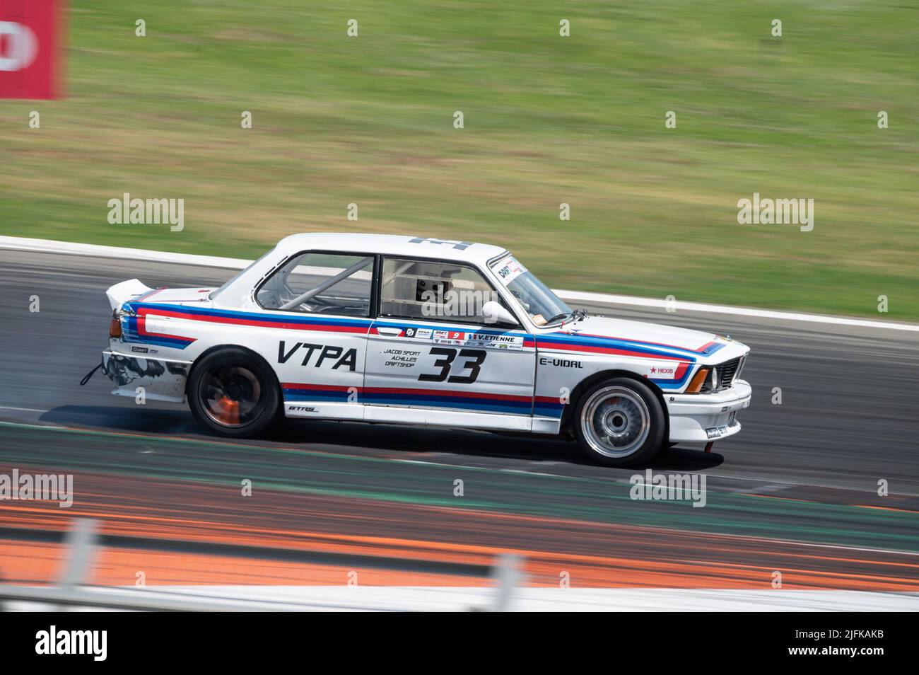 BMW E21 Alpina running on the Valencia racing circuit Stock Photo - Alamy