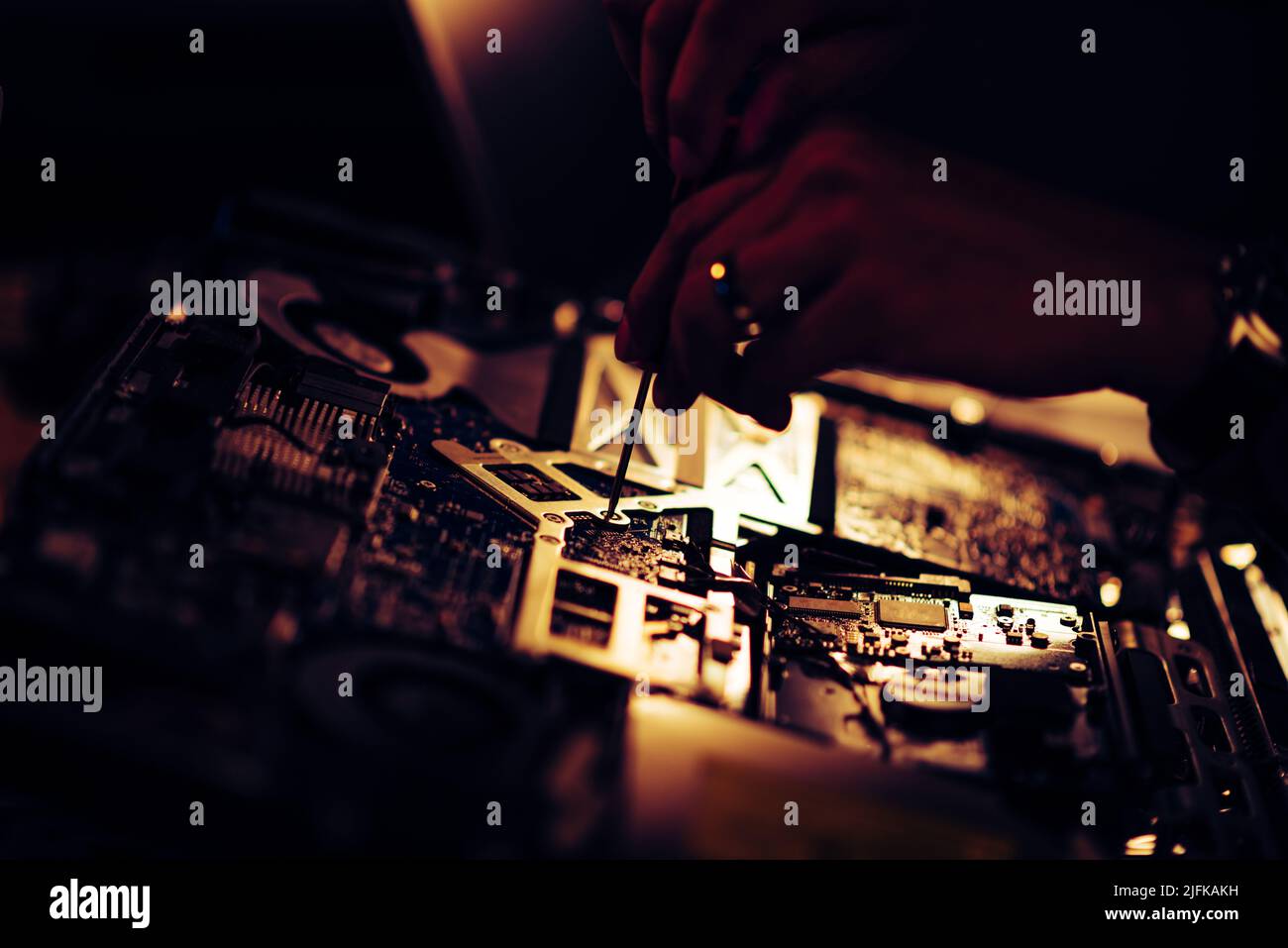 Technician reparing a broken computer. Computer service and repair ...