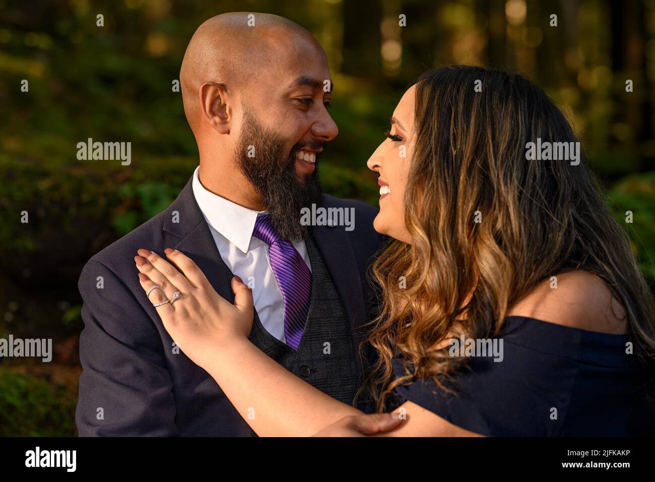 Full Of Love Photo Of An Affectionate Mixed Race Young Couple Holding