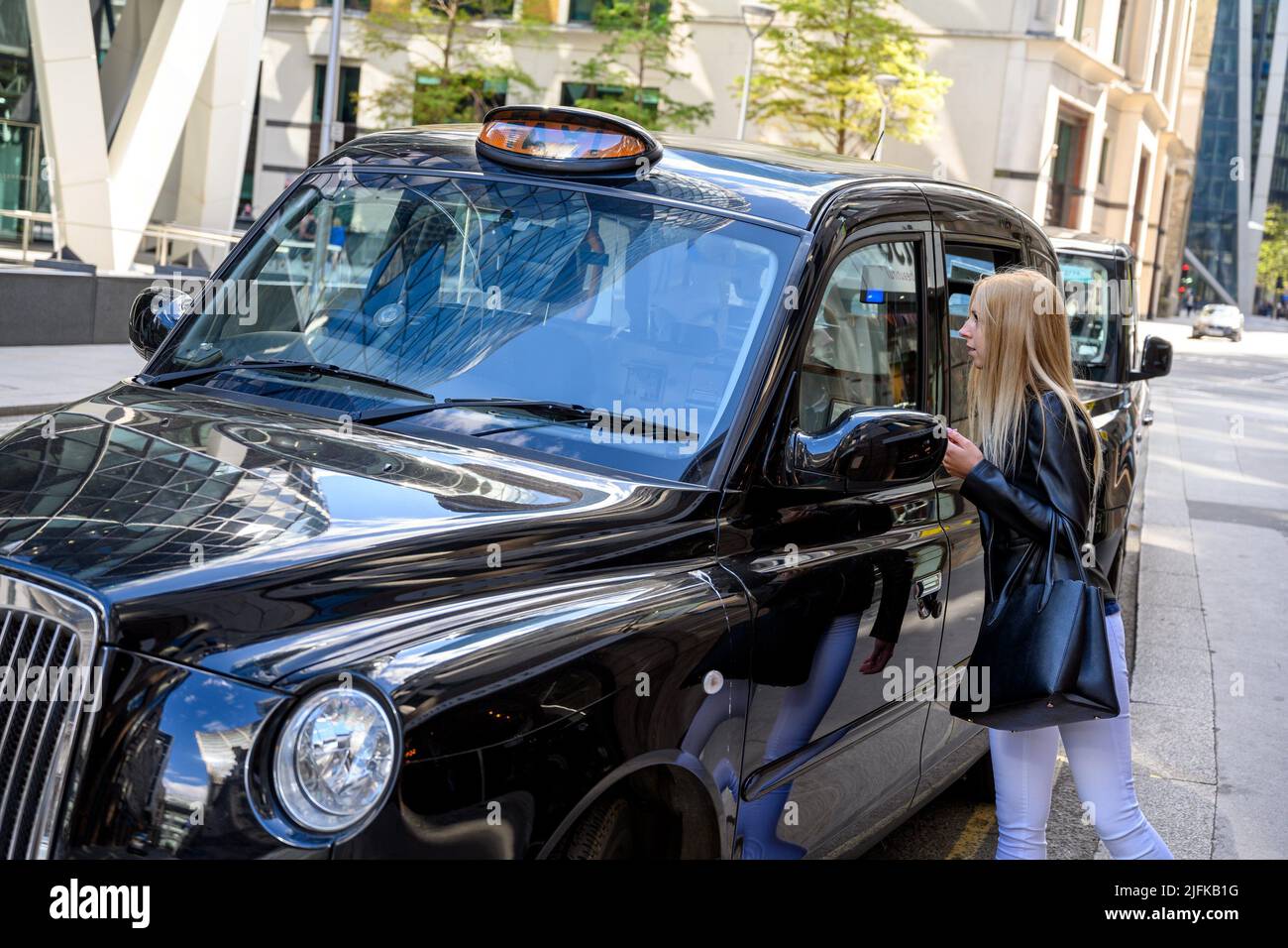 London female taxi driver hi-res stock photography and images - Alamy