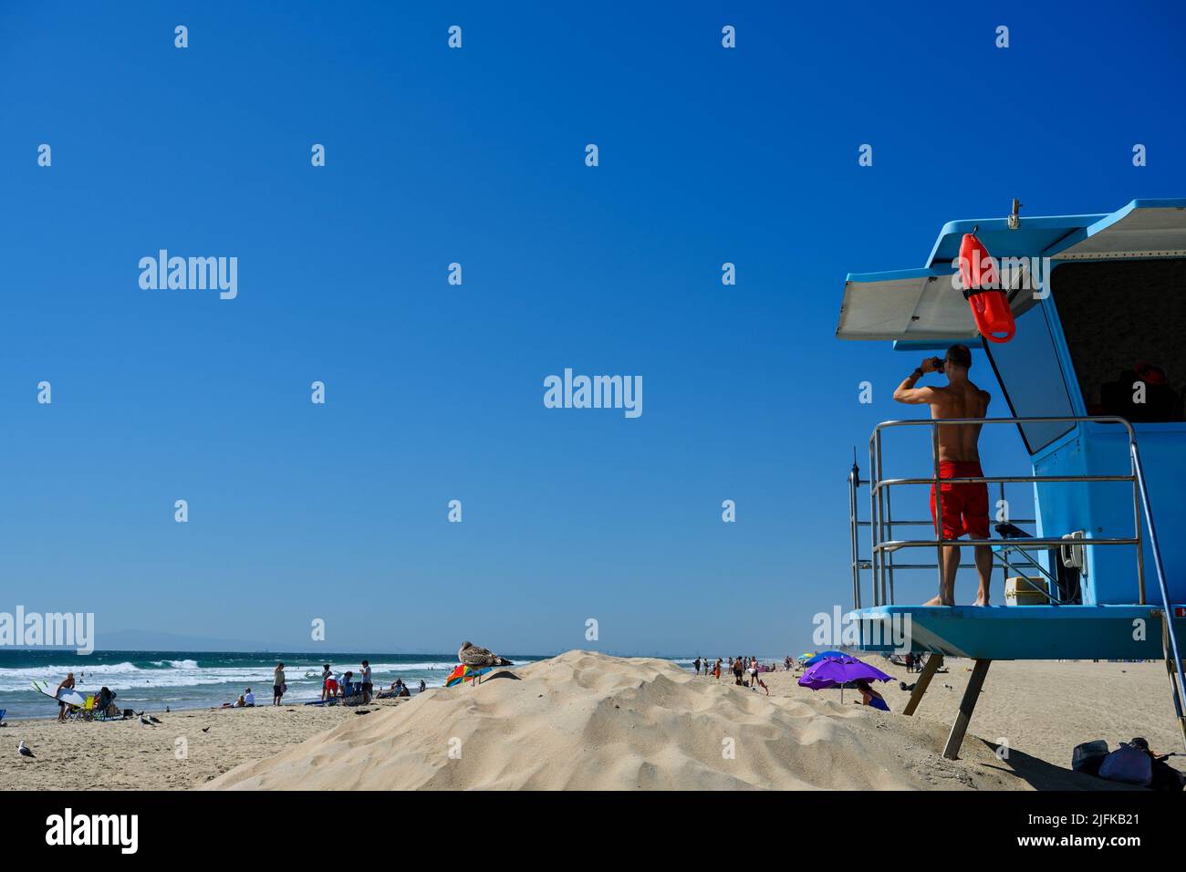 Beach lifeguard sitting in tower hi-res stock photography and images ...