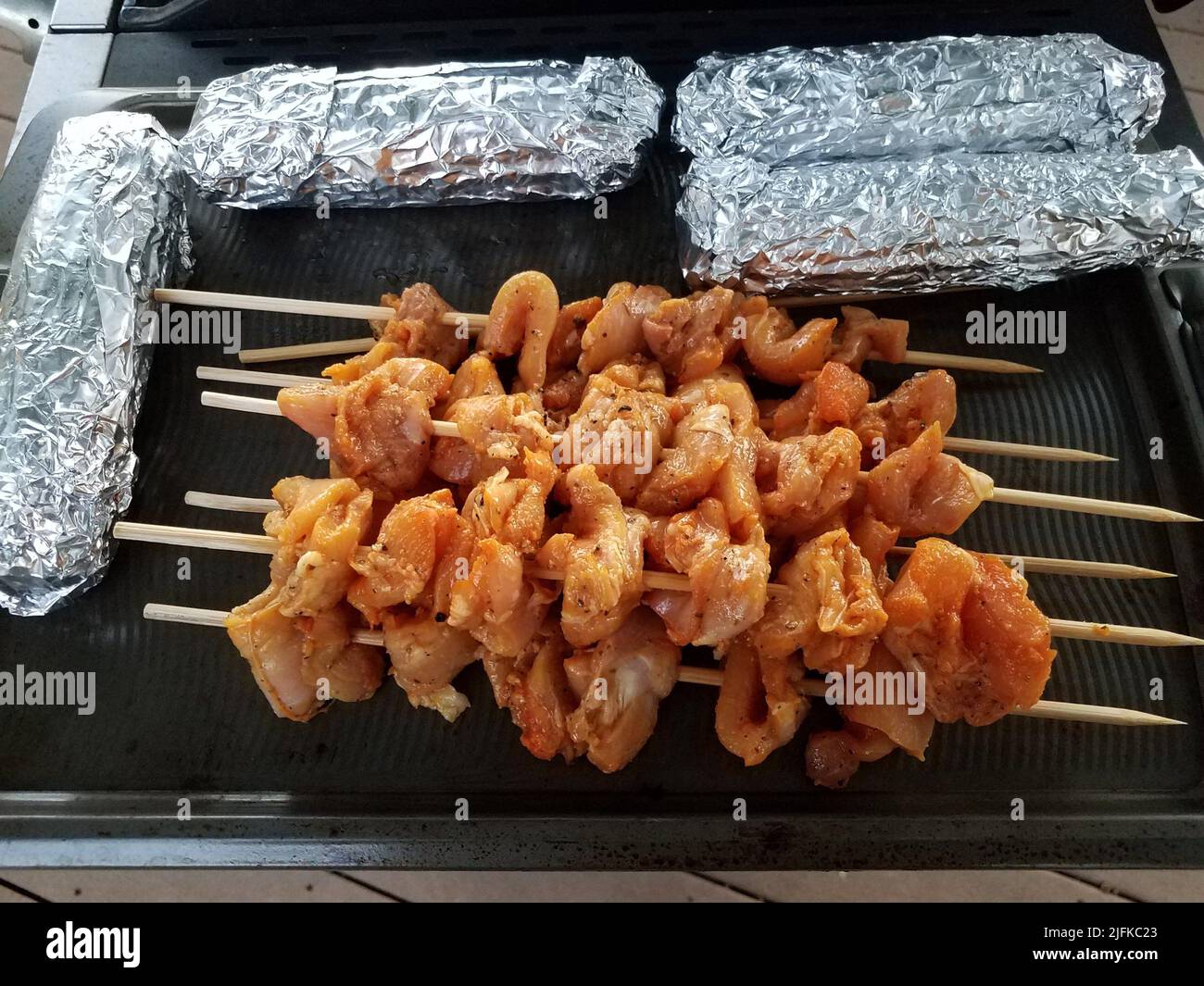 Raw kebab on sticks hi-res stock photography and images - Alamy
