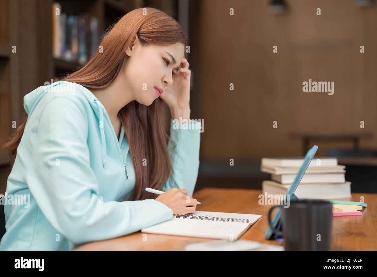 Education concept, Teenage girl feel confused while watching video math ...