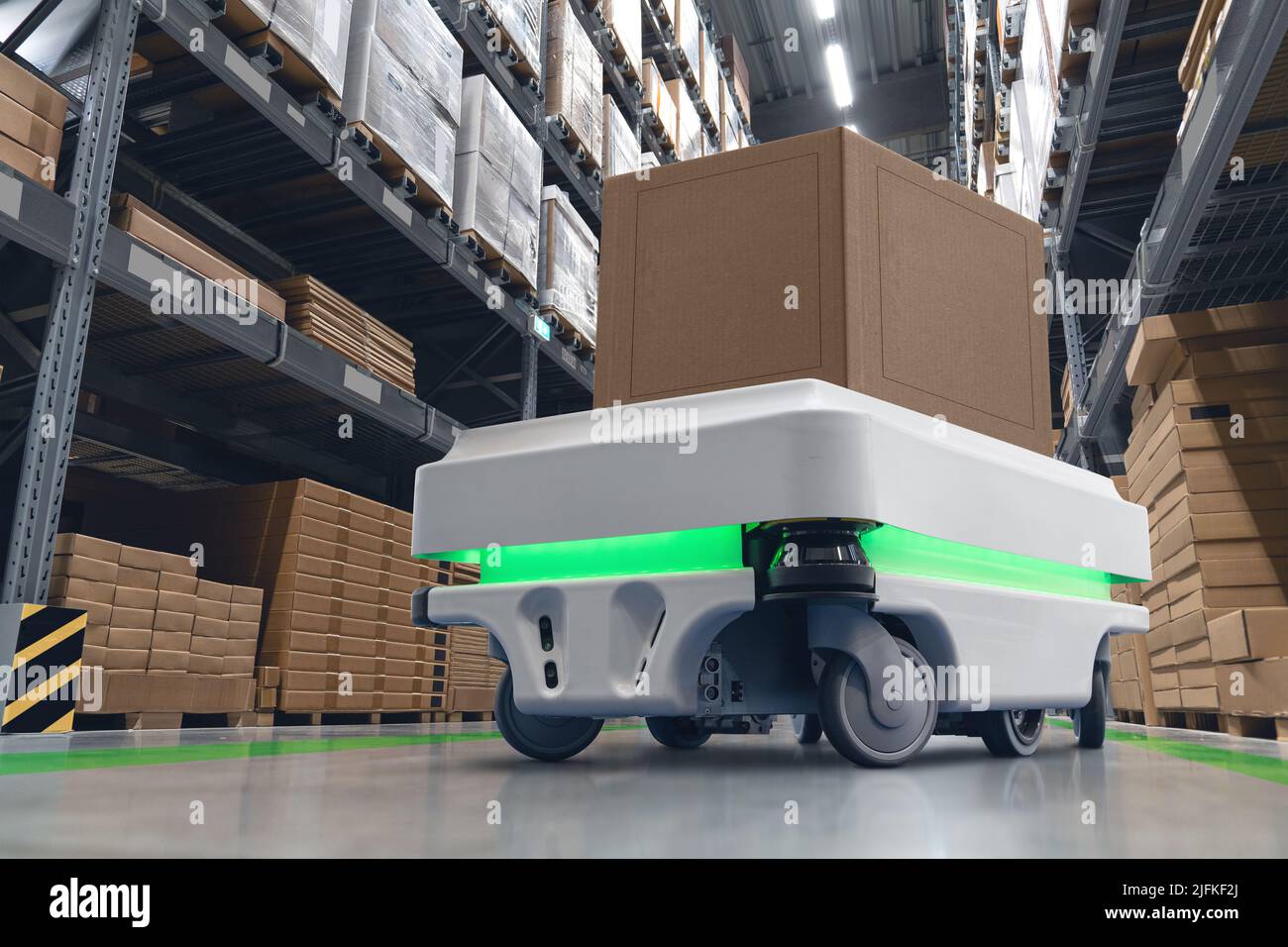 Mobile robot transporting a box in a warehouse. Concept Stock Photo - Alamy