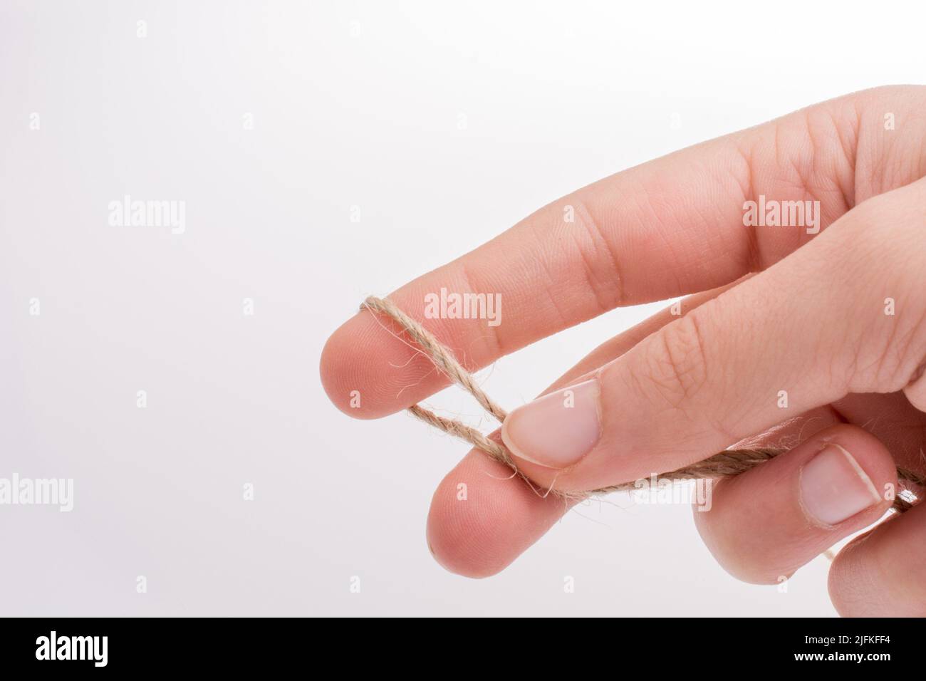Thread holding needle hi-res stock photography and images - Alamy