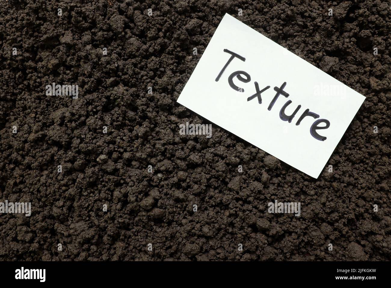Soil texture for agriculture concept. Written word on piece of paper on ...