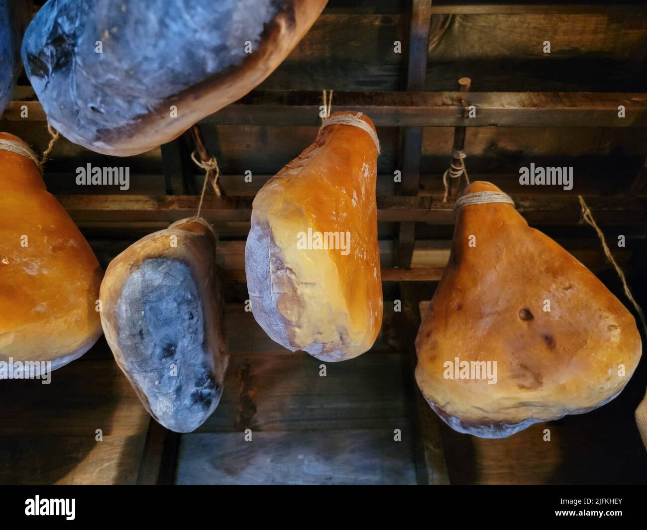 Dried ham hanging hi-res stock photography and images - Alamy