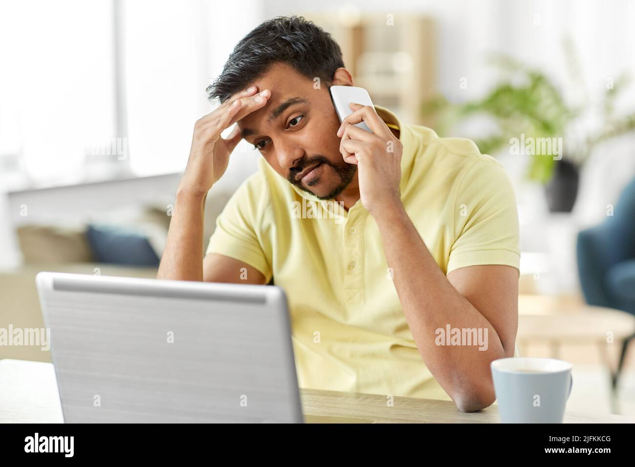 Serious asian man calling smartphone hi-res stock photography and ...