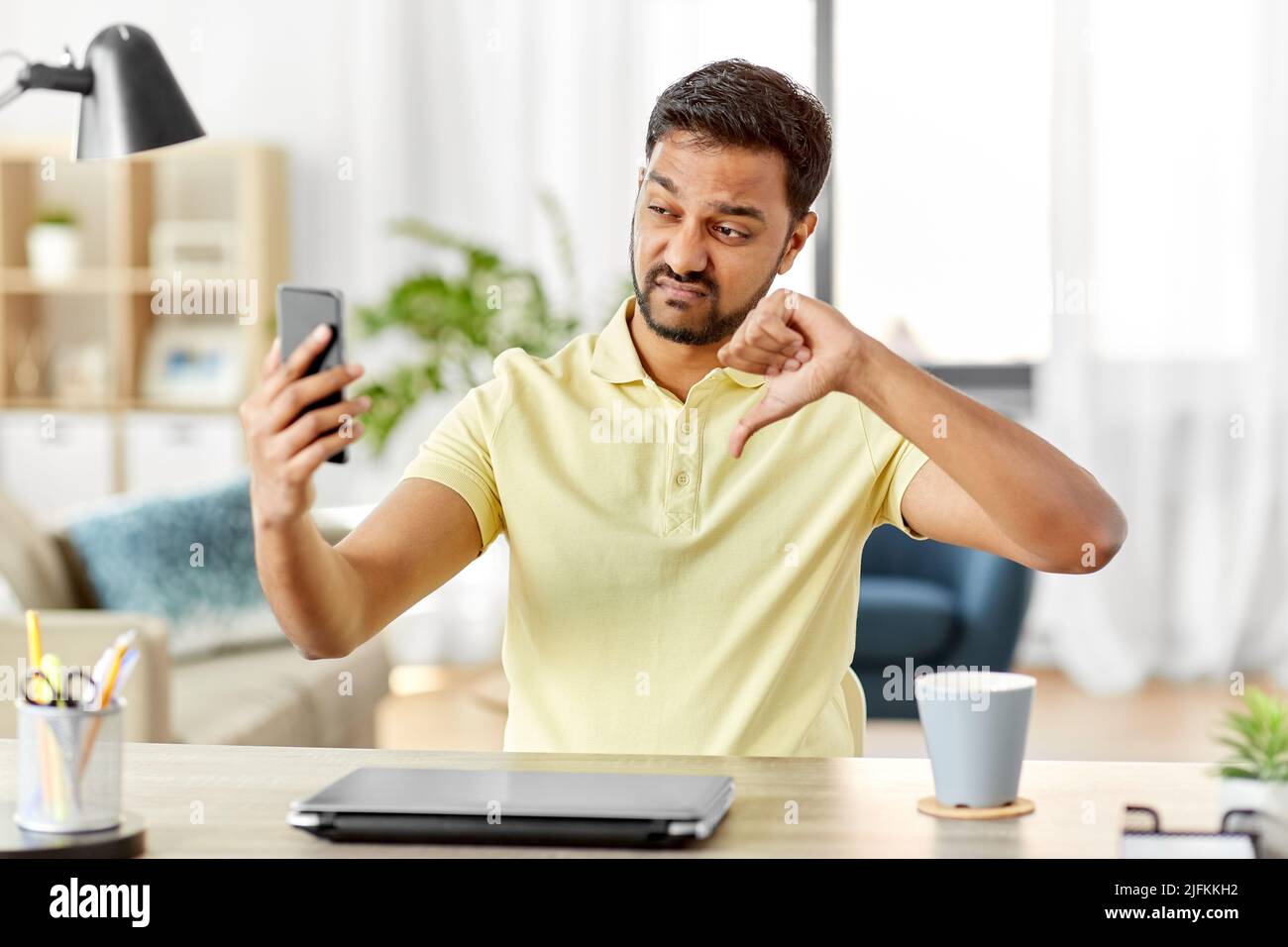 Indian man businessman video call hi-res stock photography and images ...