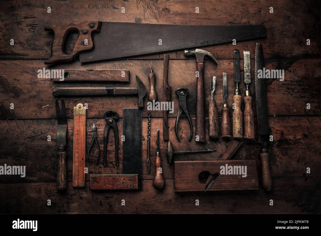flat lay picture of big set of vintage tools used for carpentry with ...