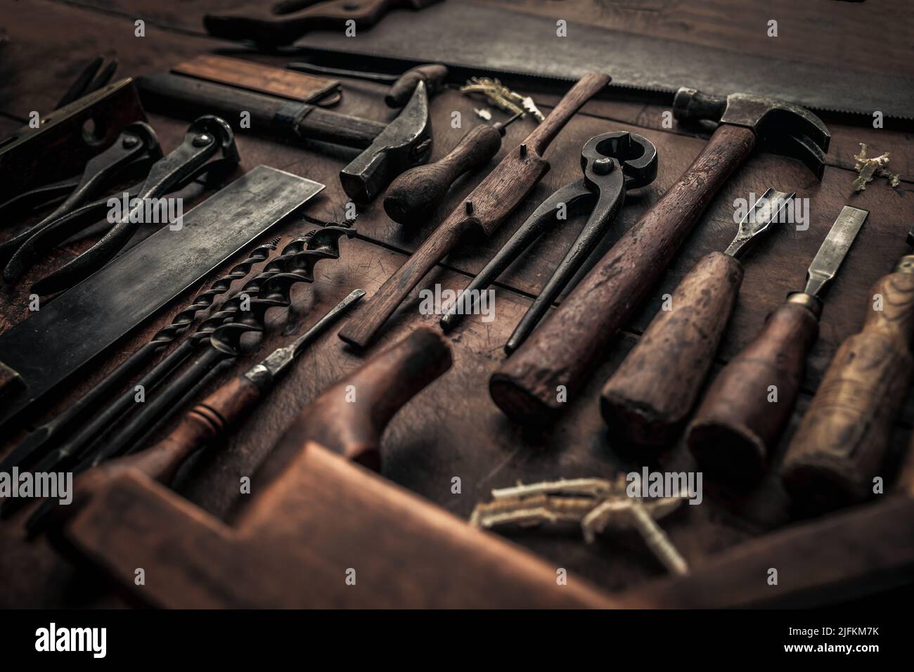 set of vintage tools for carpentry with pinces, chisels, drills, gouge ...