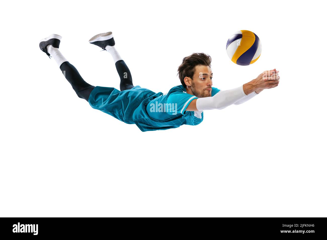 Portrait of young man, volleyball player in motion, training, playing ...
