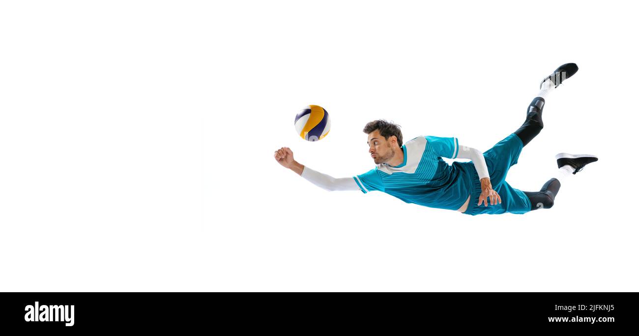 Portrait of young man, volleyball player in motion, training, playing ...